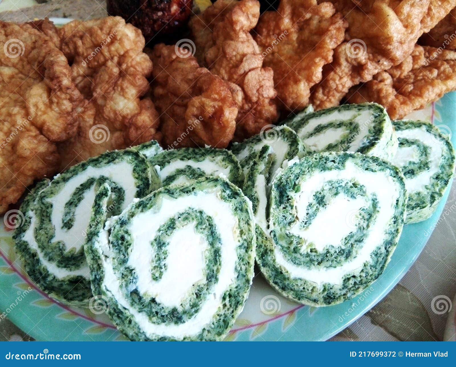 Chicken Schnitzel and Roll with Cheese and Spinach Stock Photo - Image ...