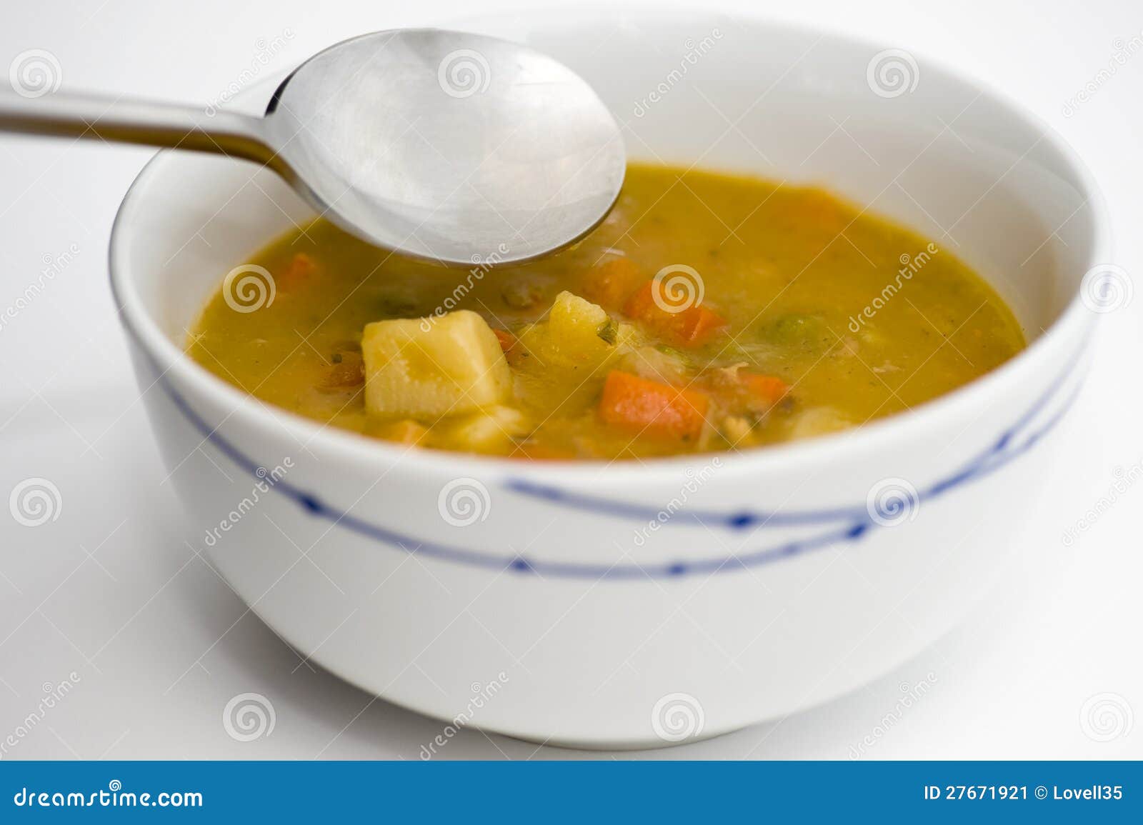 Chicken soup with spoon stock image. Image of vegetables - 27671921