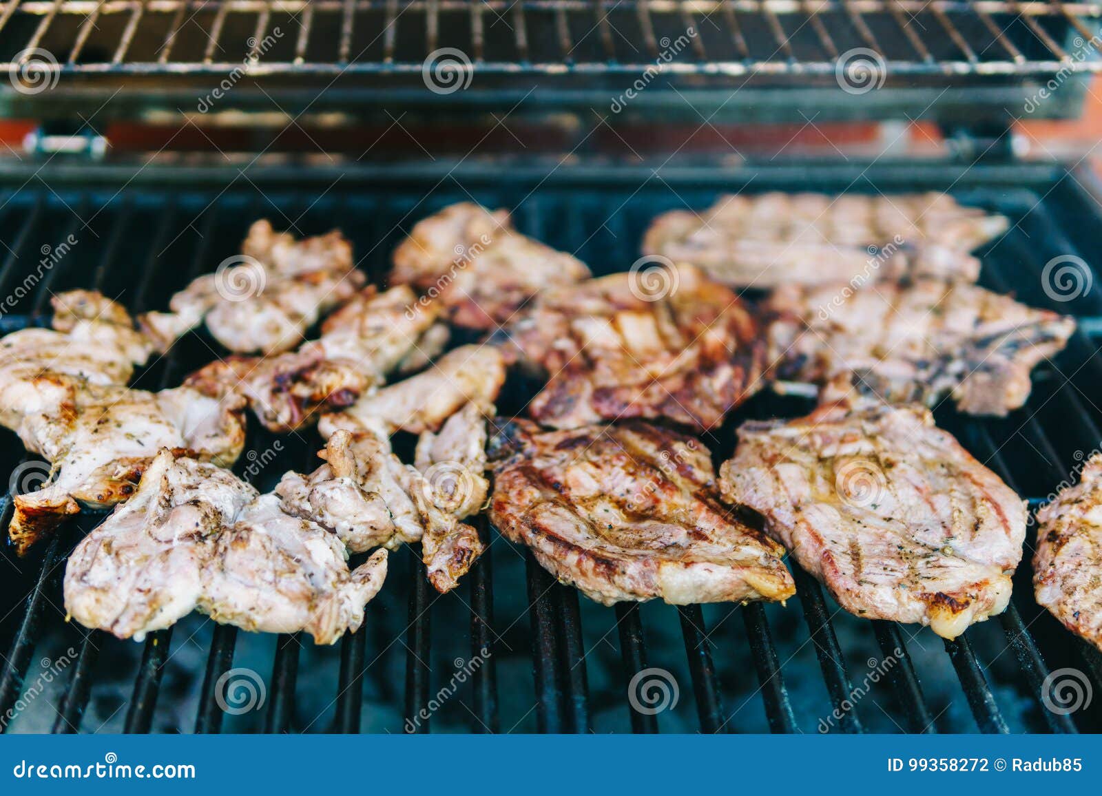 Chicken Stakes on Barbecue stock photo. Image of smoke - 99358272