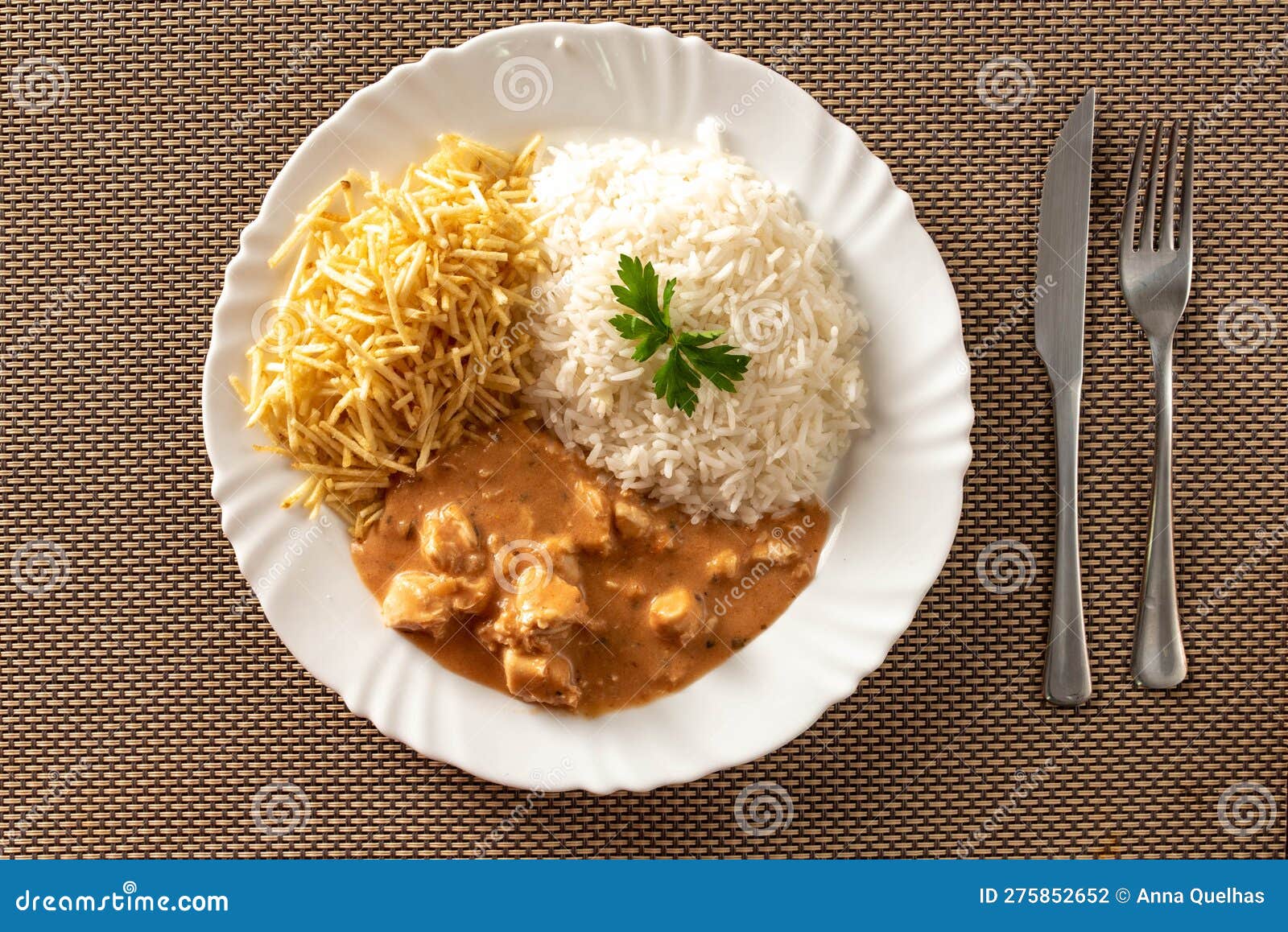 Chicken Stroganoff Accompanied with Rice, Salad and Potato Straw Stock ...