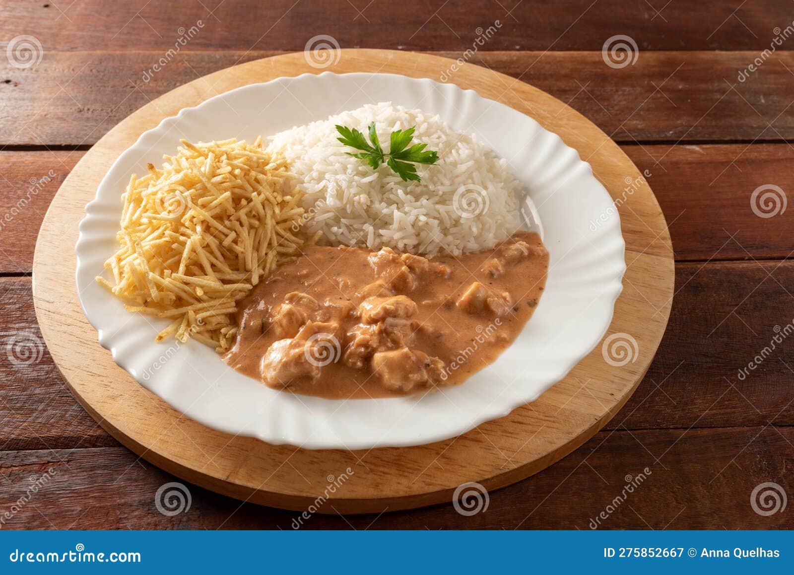 Chicken Stroganoff Accompanied with Rice, Salad and Potato Straw Stock ...