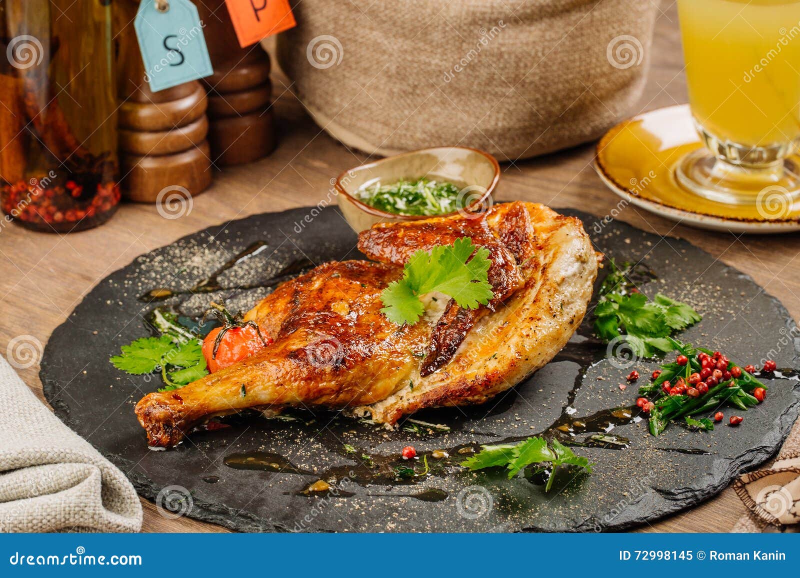 Chicken Tabaka with Sauce on Stone Plate. Stock Image - Image of ...