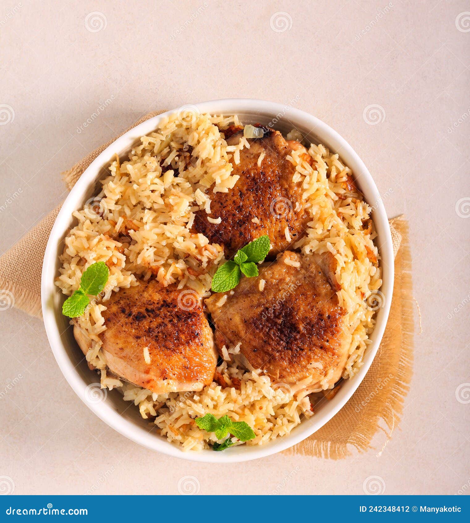 Chicken thighs with rice stock photo. Image of view - 242348412