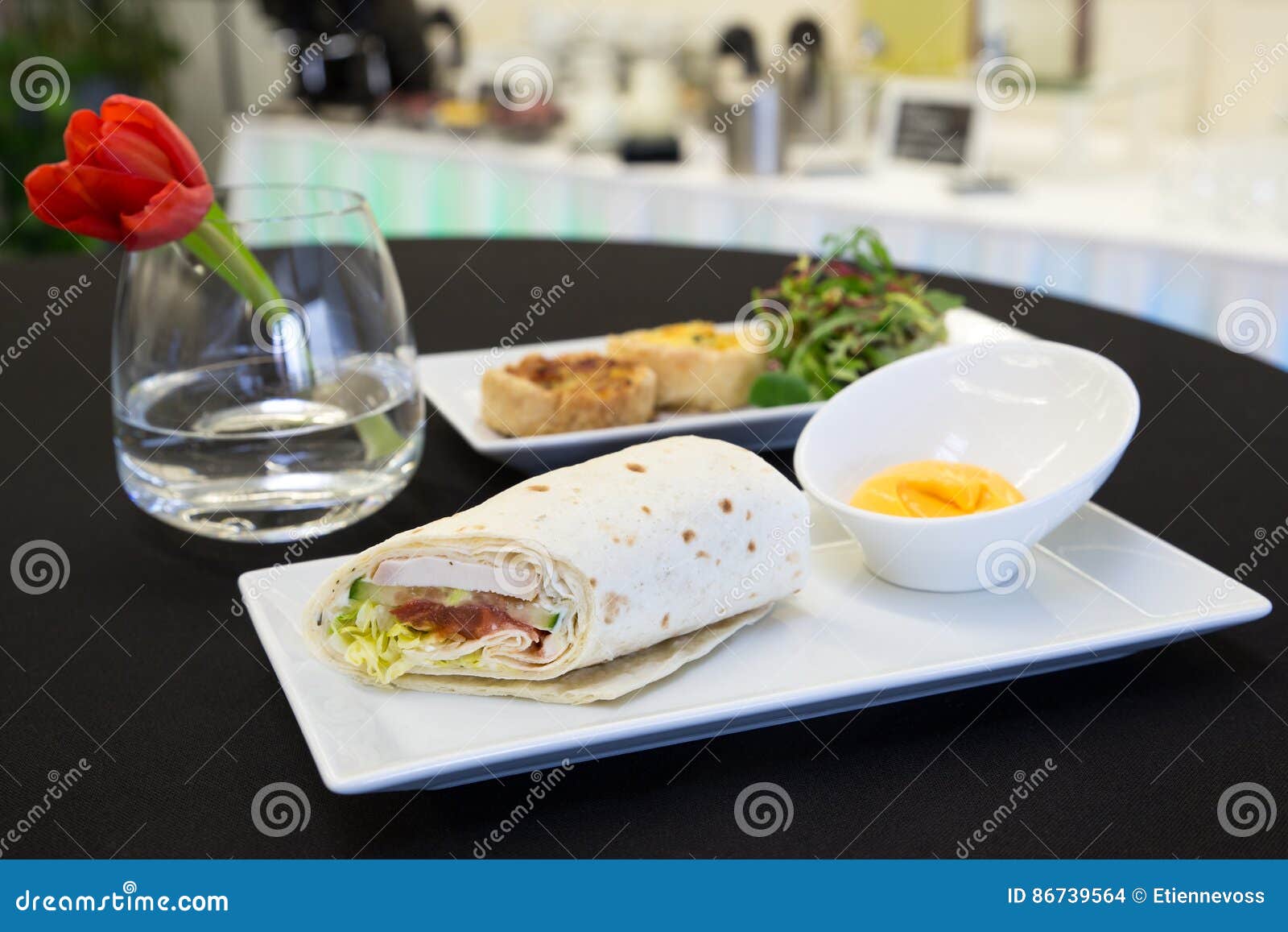 Chicken Tortilla Wrap with Dip and Two Quiches. Stock Photo - Image of ...