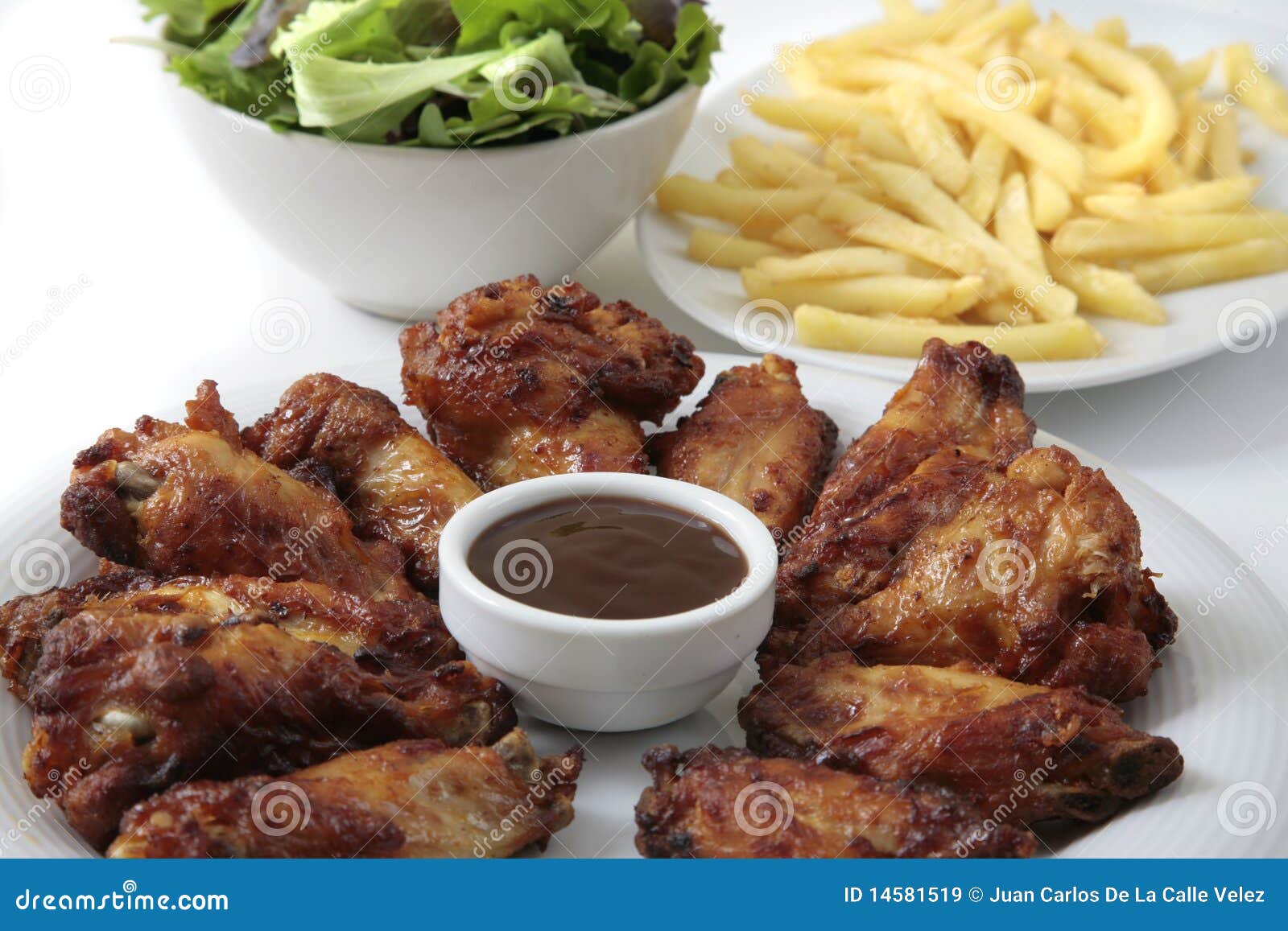 Chicken wings dinner stock image. Image of wings, fries - 14581519