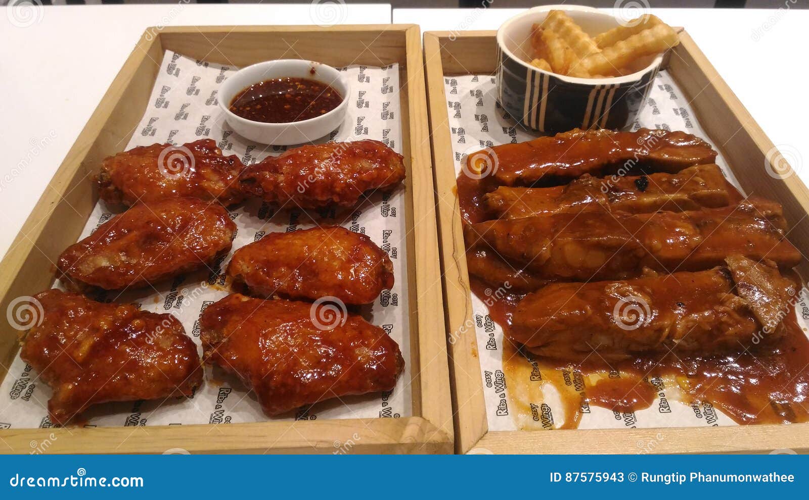Chicken Wings and Ribs with Fries Stock Image - Image of plate, cooked ...