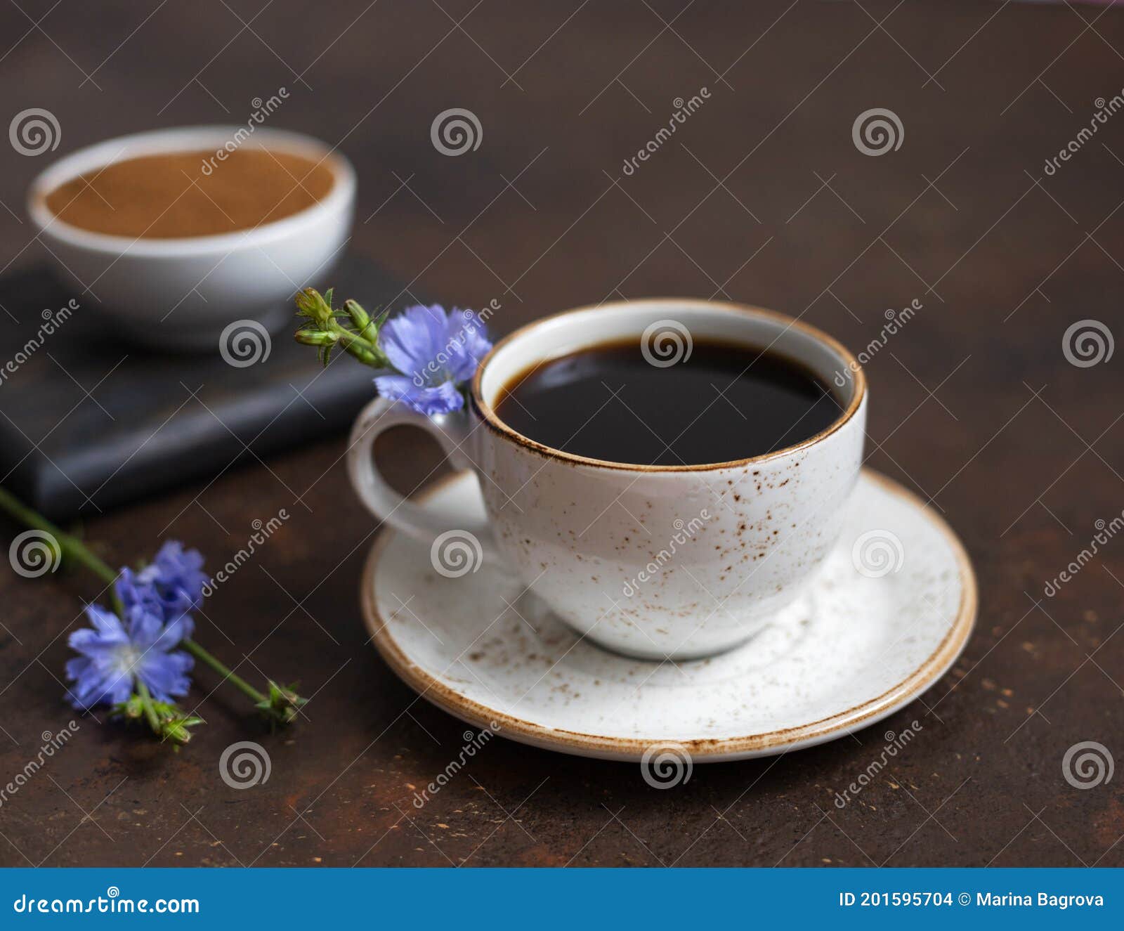 Chicory Coffee and Blue Flowers on a Dark Brown Background. Ground ...