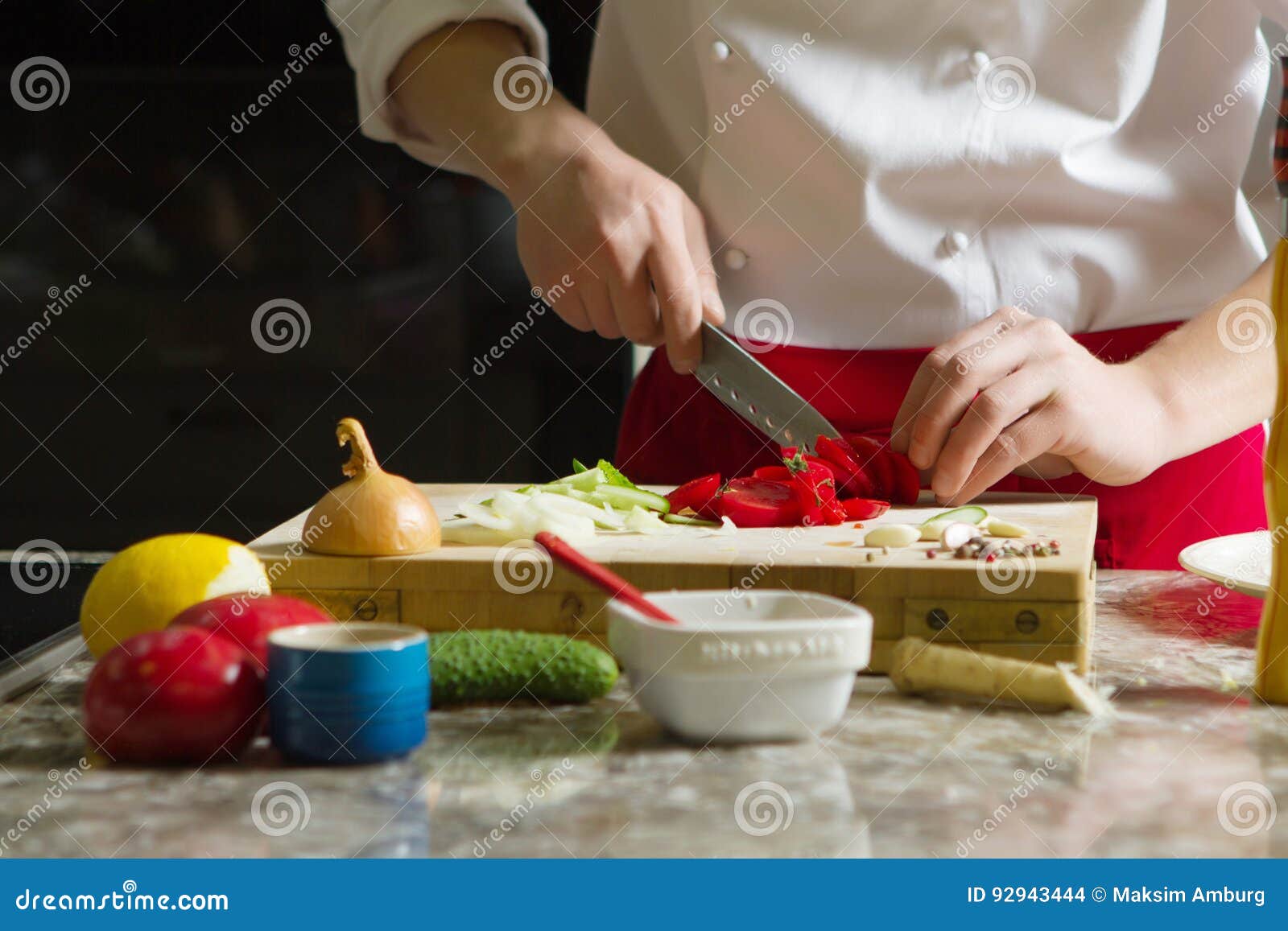 Chief Cook Cut the Tomato with the Knife in Kitchen Stock Photo - Image ...