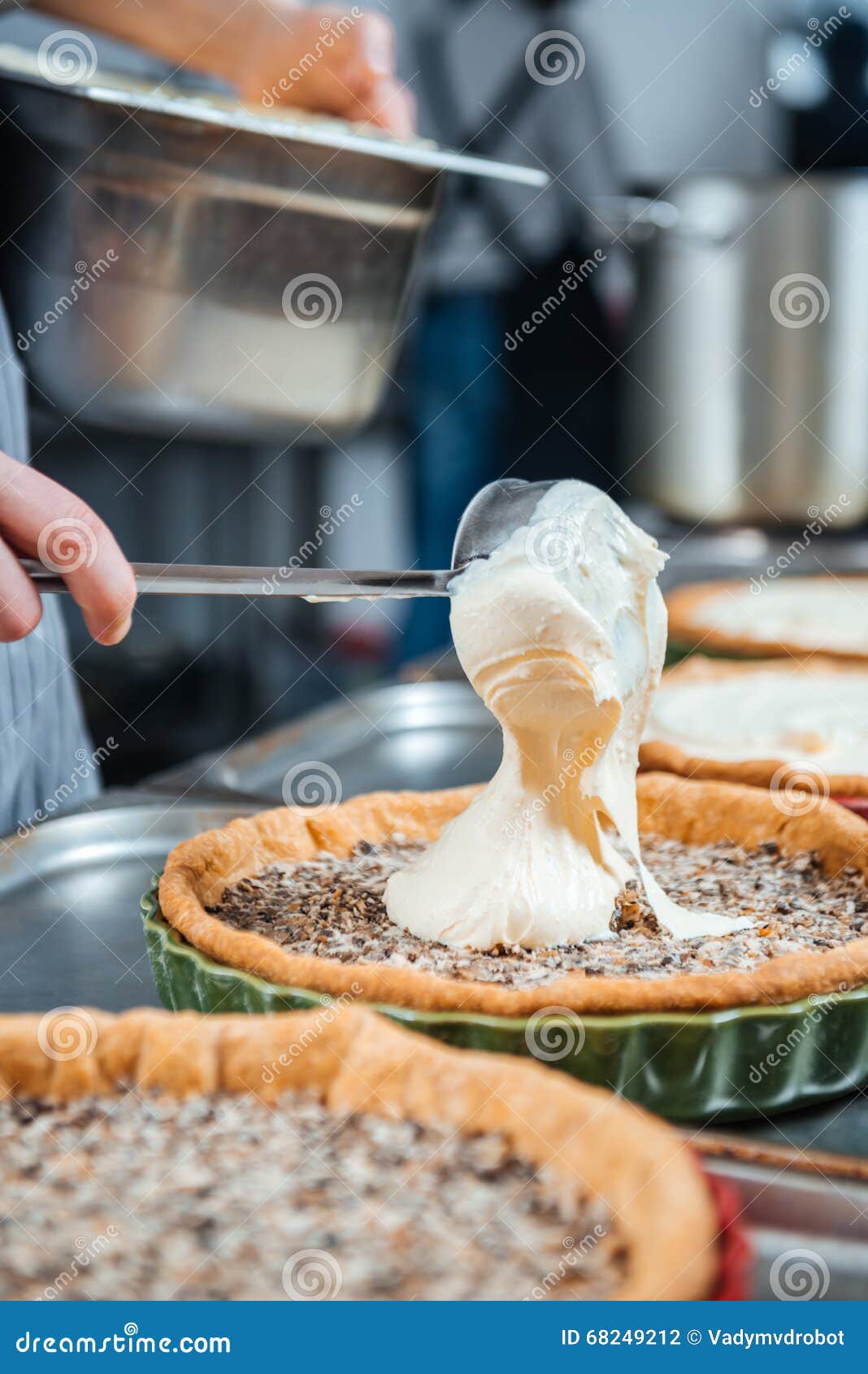 Chief Cook in Process of Cooking Several Pies with Cream Stock Photo ...