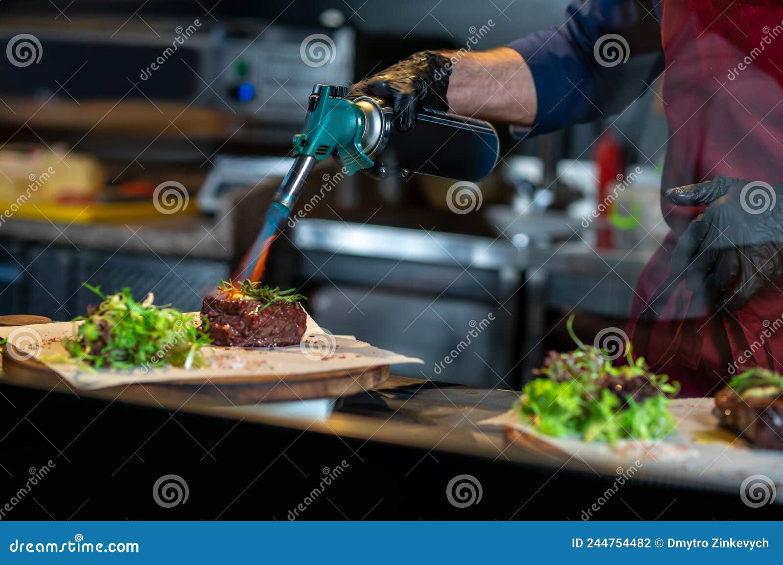 A Chief-cooker Cooking in the Kitchen in the Restaurant Stock Photo ...