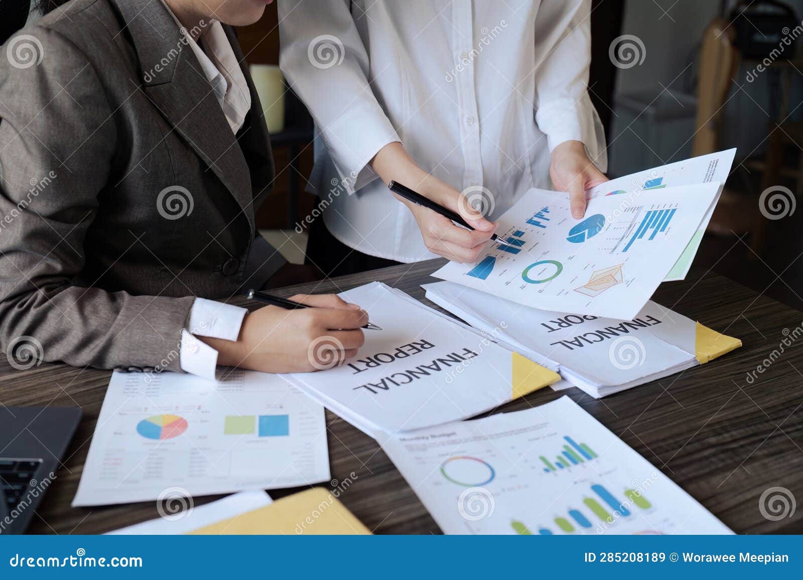 Chief and Employee Discuss Monthly Earning Graph Together in the Office ...