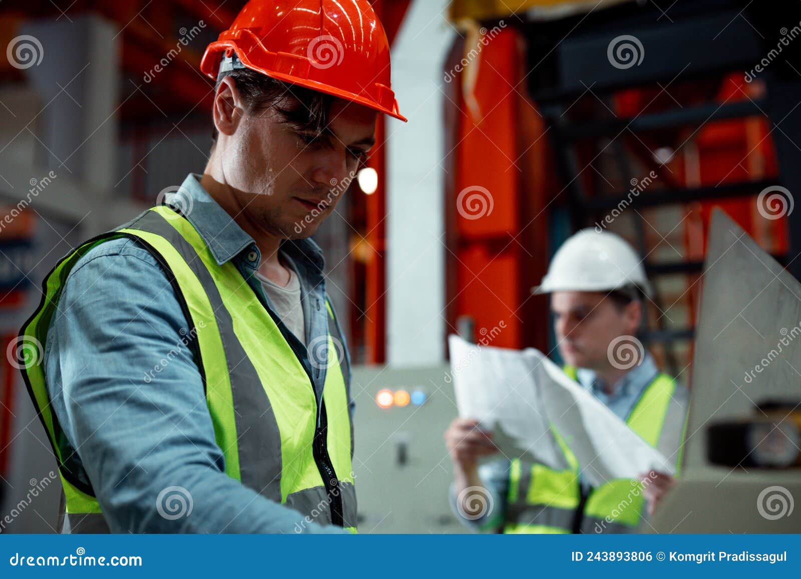 Chief Engineer is Looking at a Work that he is Checking Security System ...