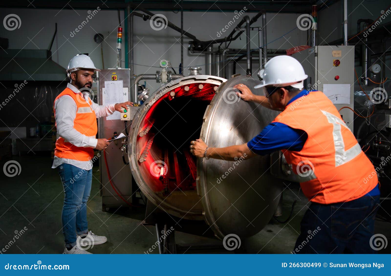 Chief Engineer of a Mechanical Plant Inspecting and Explaining the ...