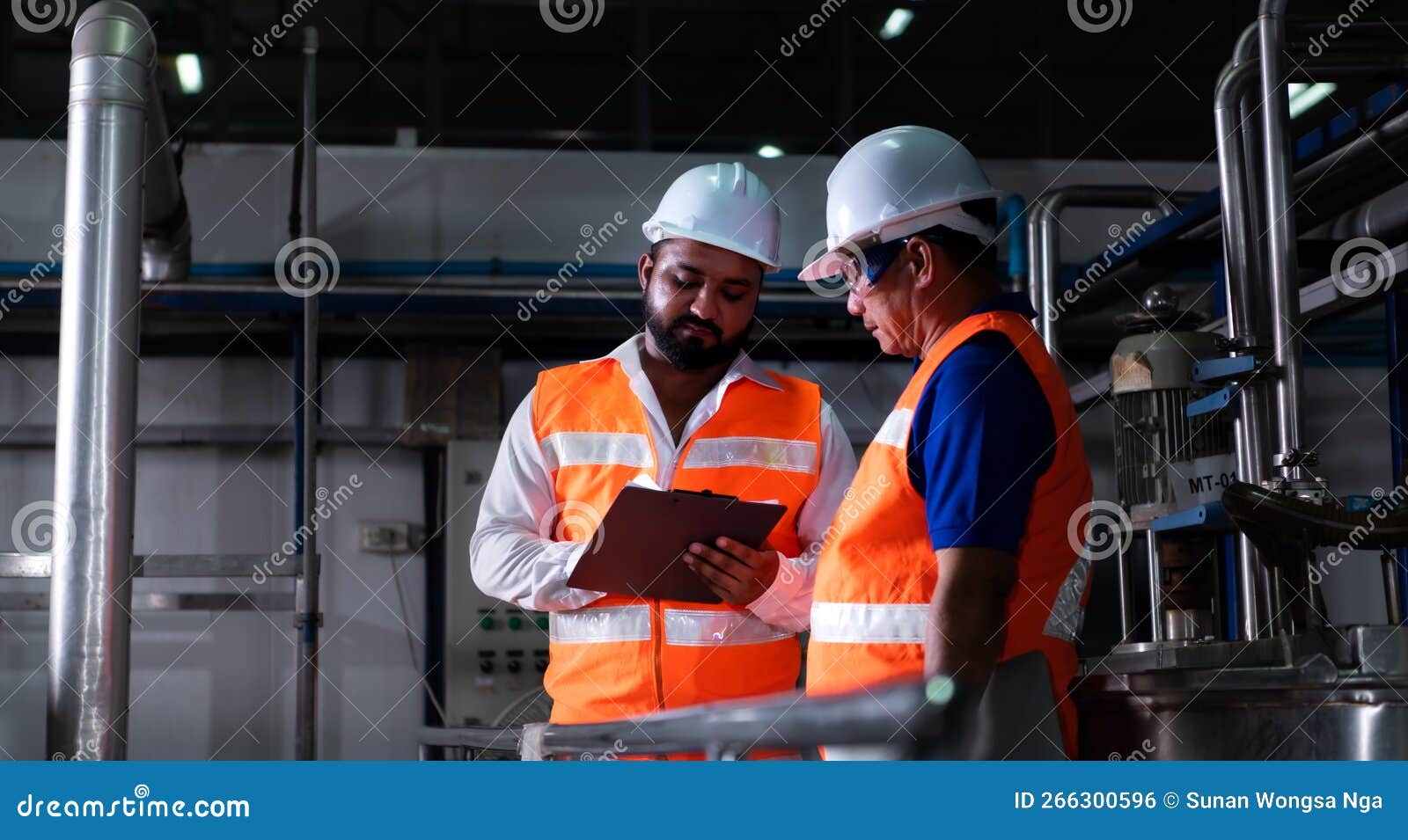 Chief Engineer of a Mechanical Plant Inspecting and Explaining the ...