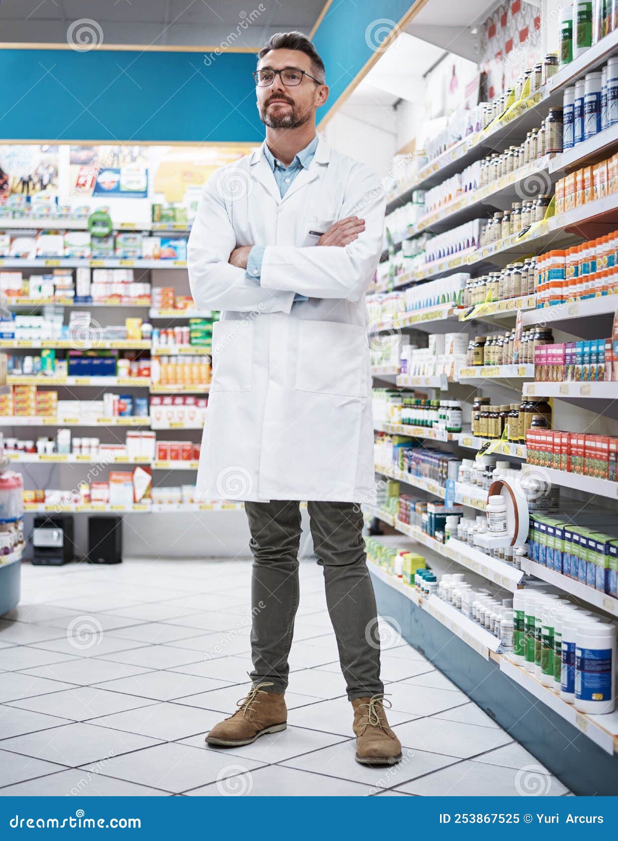 The Chief Pharmacist. a Confident Mature Pharmacist Working in a ...