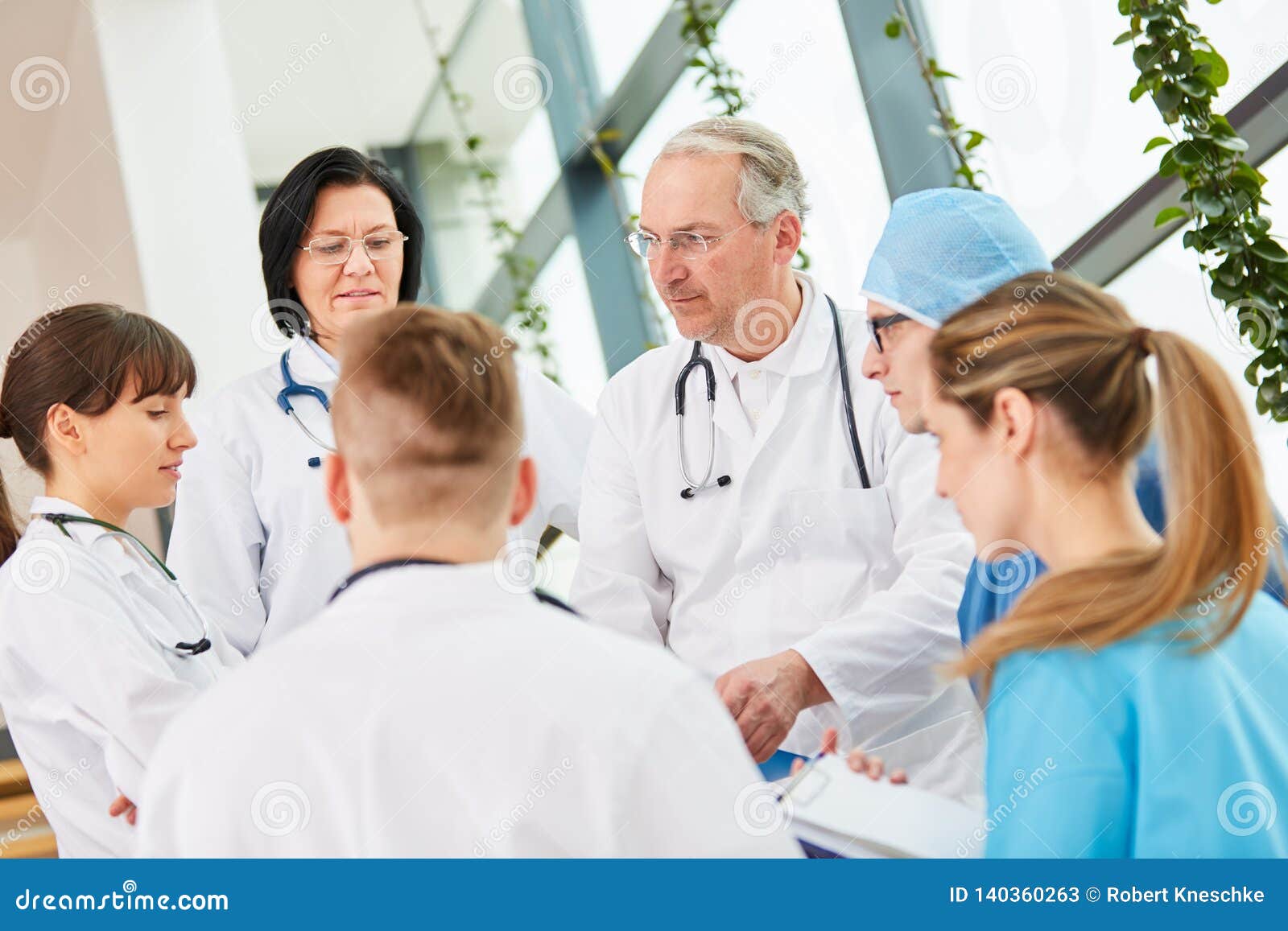 Chief Physician with Team of Doctors Stock Image - Image of health ...