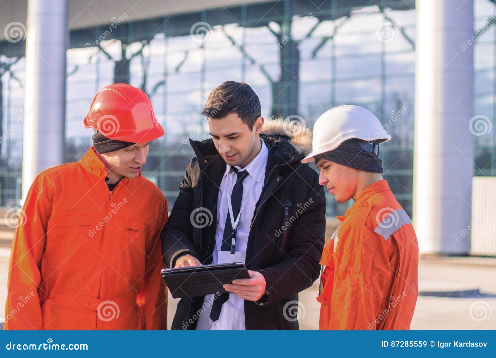 Chief Showing the Tablet To Workers Stock Image - Image of engineer ...