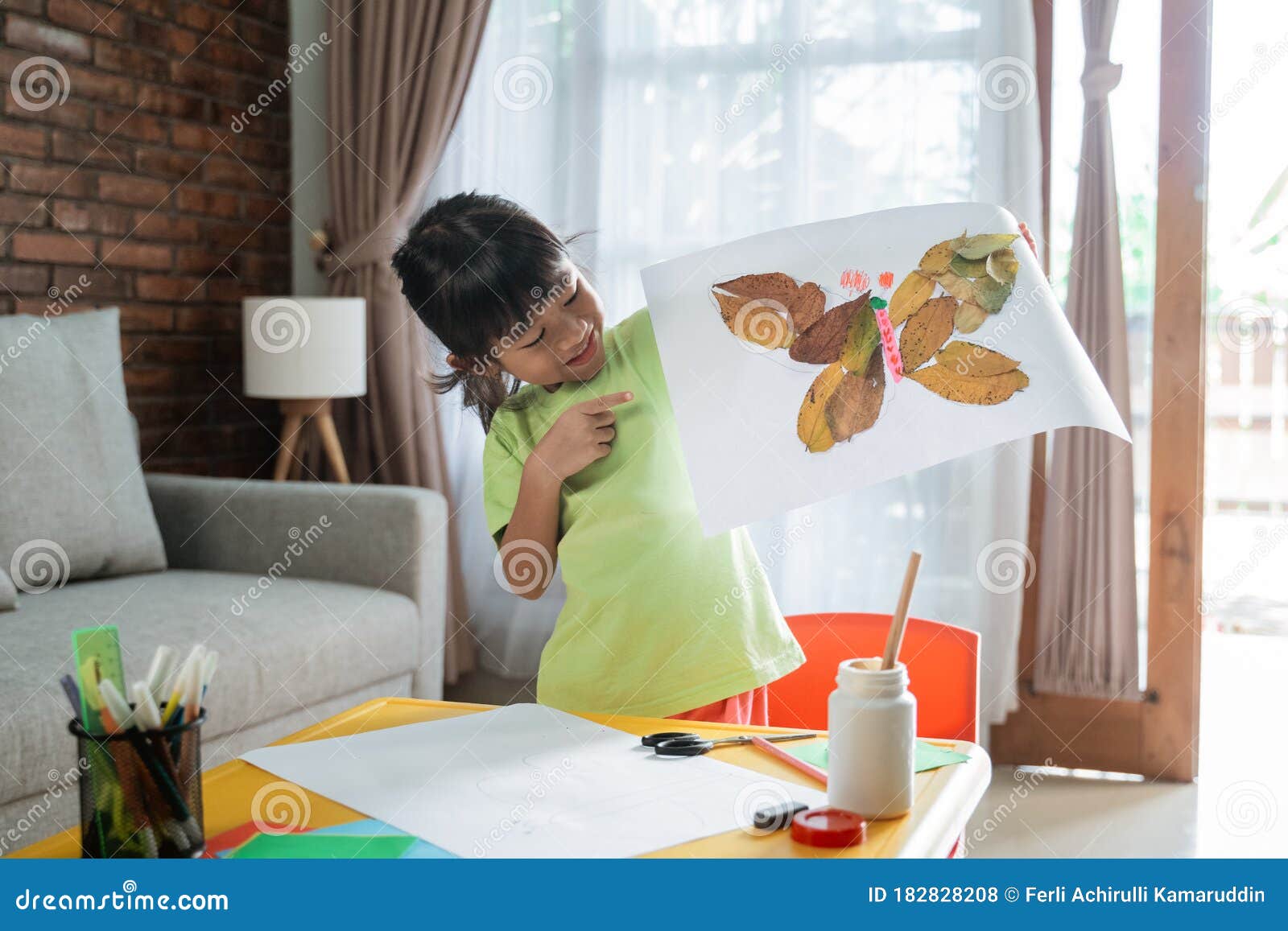 Child Activity Making Craft from Dry Leaves Stock Photo - Image of home ...