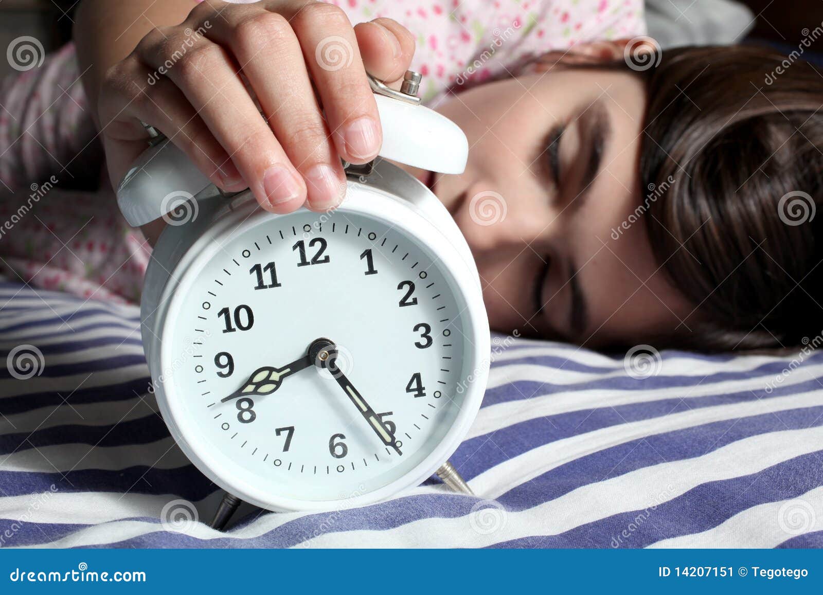 Child and alarm clock stock image. Image of brunette - 14207151