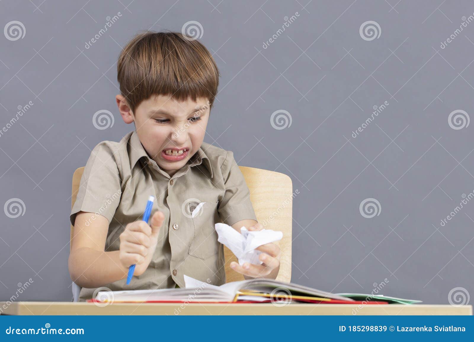The Child is Angry at Homework. Stock Image - Image of isolated ...