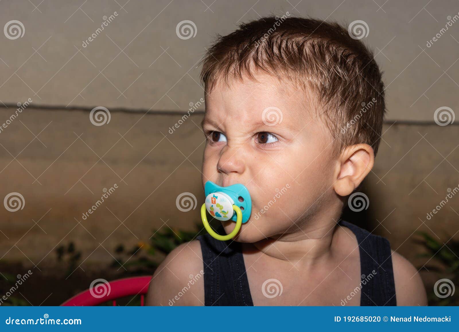 The Child is Angry with the Pacifier Stock Photo - Image of beauty ...