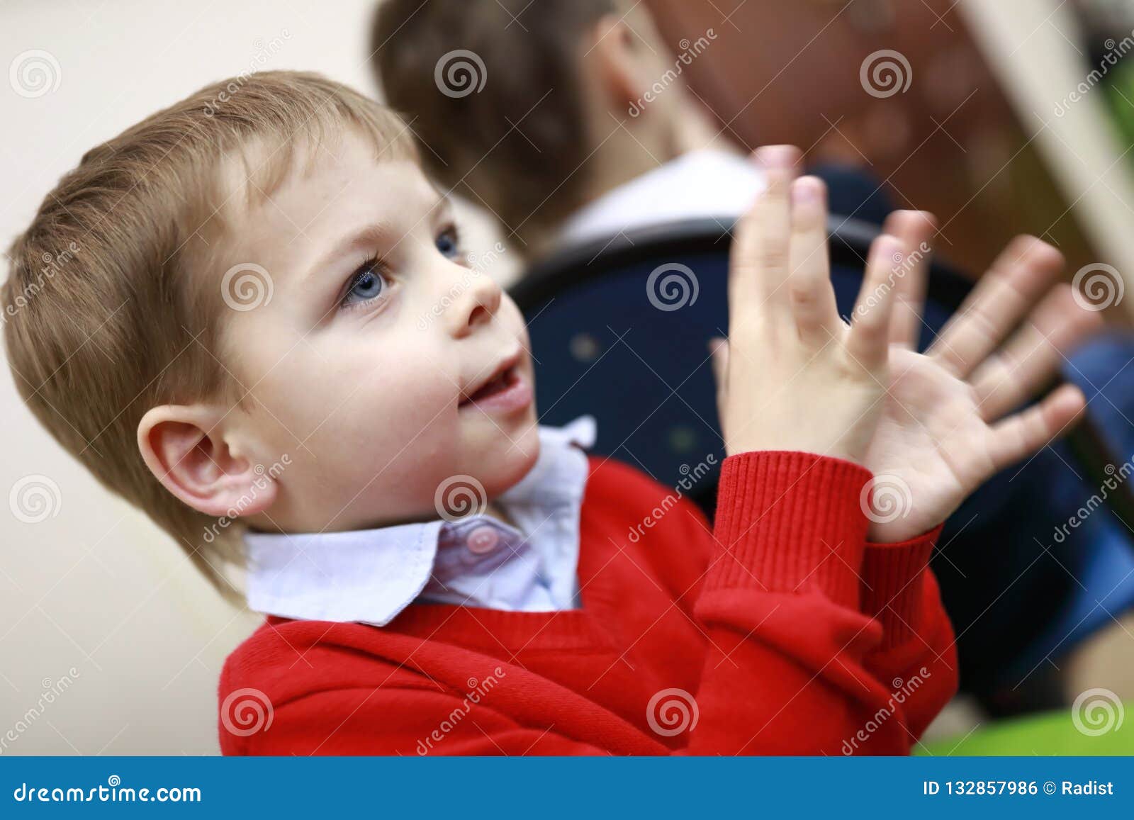 Child applauds in theater stock photo. Image of festival - 132857986