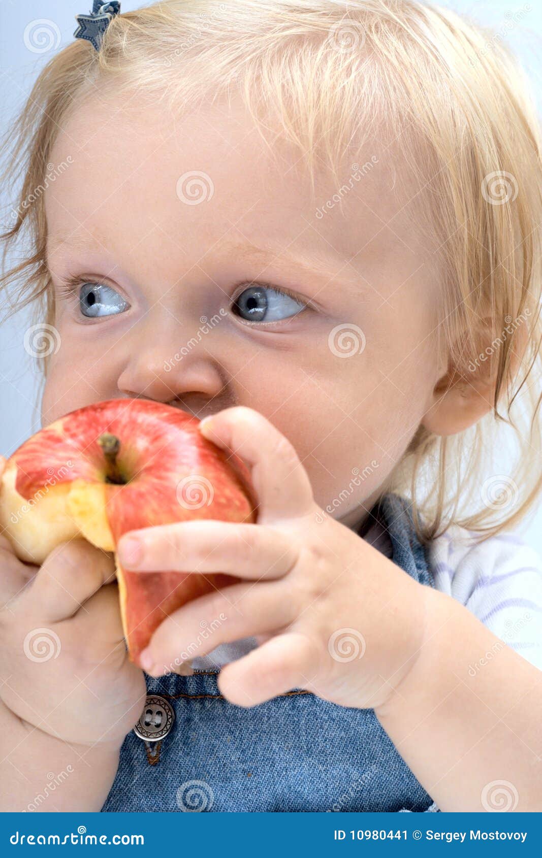 Child with the apple stock image. Image of happy, girl - 10980441