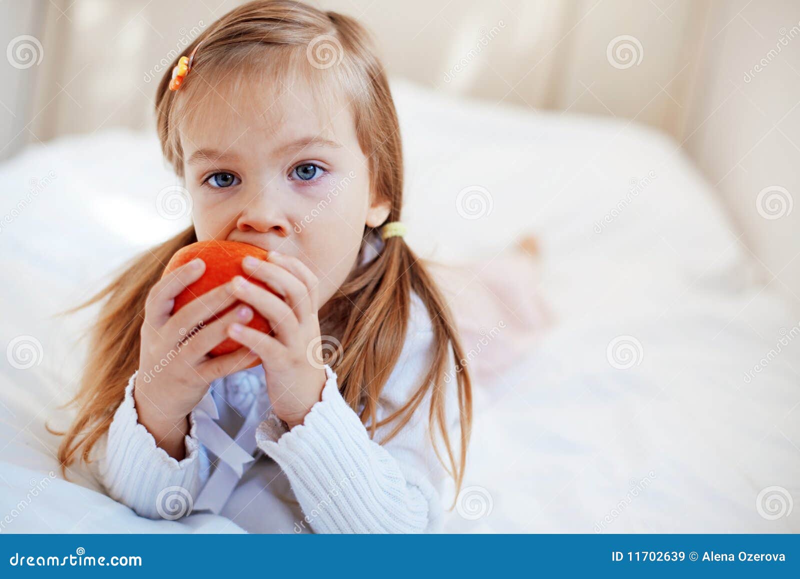 Child with apple stock image. Image of lovely, female - 11702639