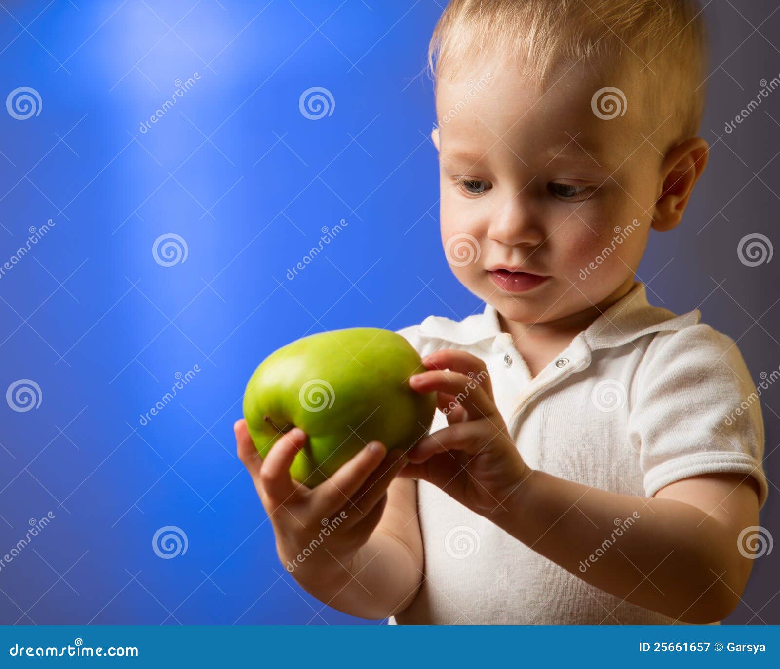 Child with apple stock image. Image of child, shirt, yellow - 25661657