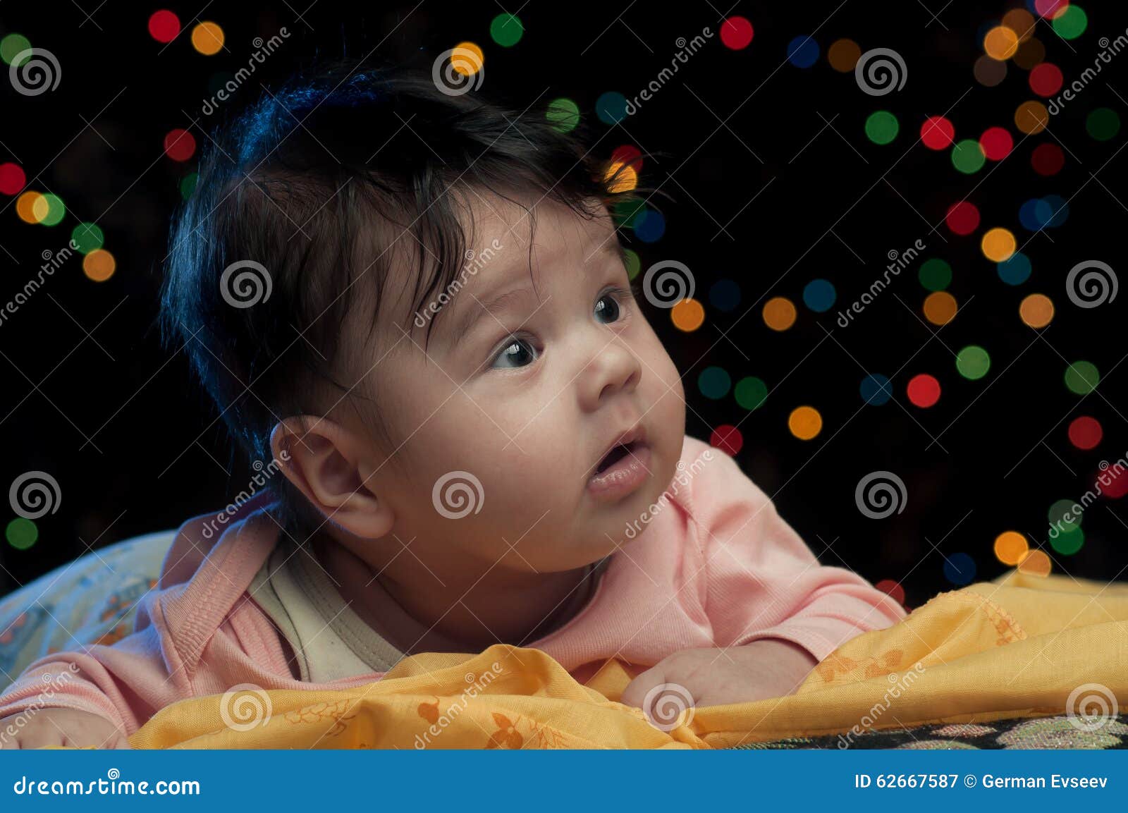 Child on a Background of Lights Stock Image - Image of candle, decor ...