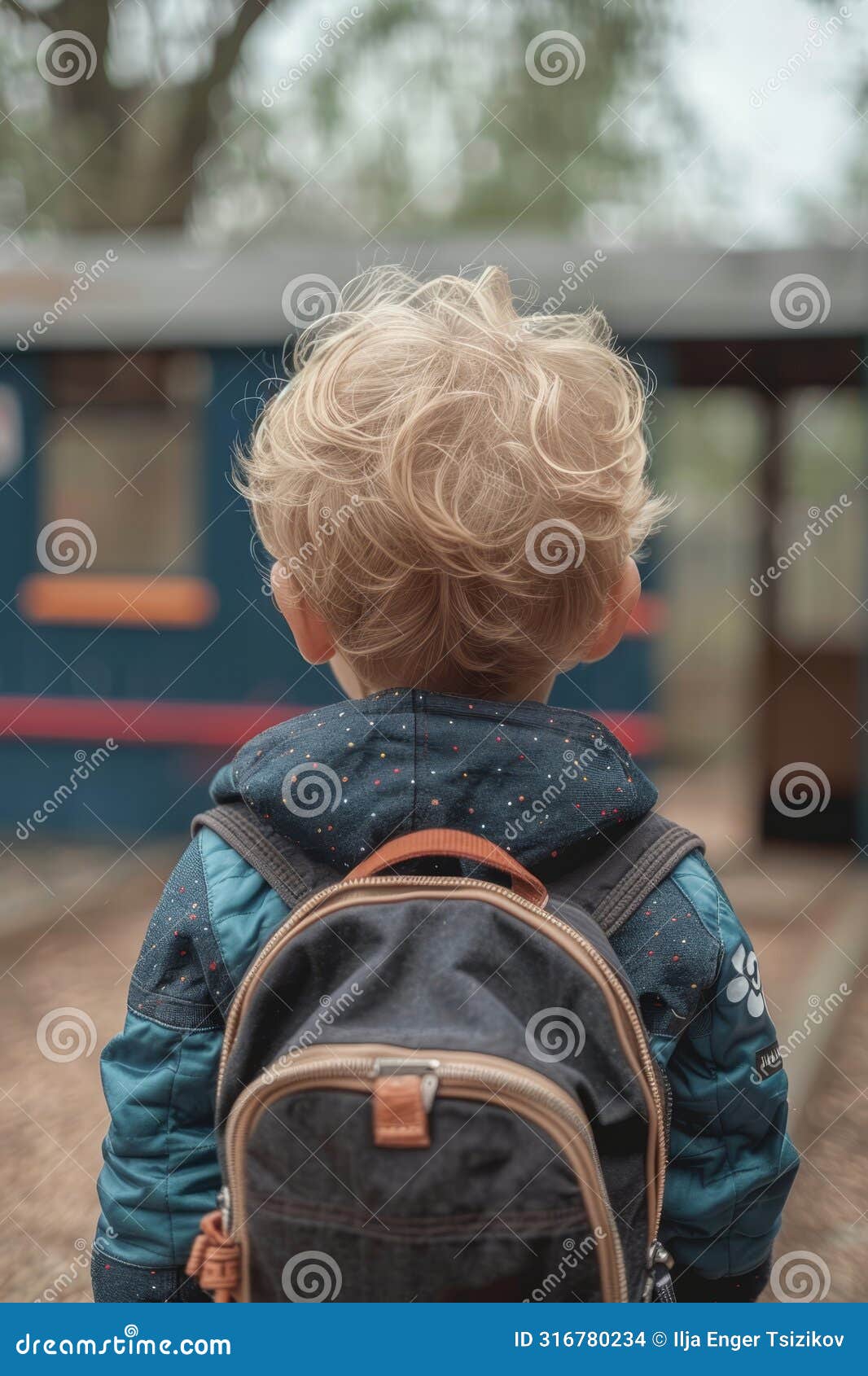 Child with Backpack Walking Towards the School Bus from Behind in ...