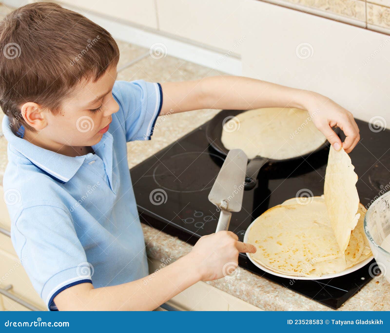 Child bakes pancakes stock image. Image of crepes, frying - 23528583
