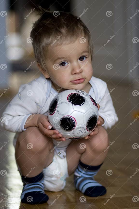 Child with ball stock photo. Image of black, arranged - 6202206
