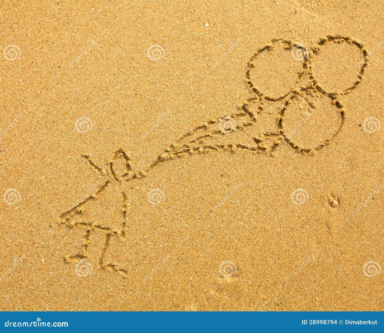 Child with Balloons Drawing on the Sand Stock Photo - Image of ball ...