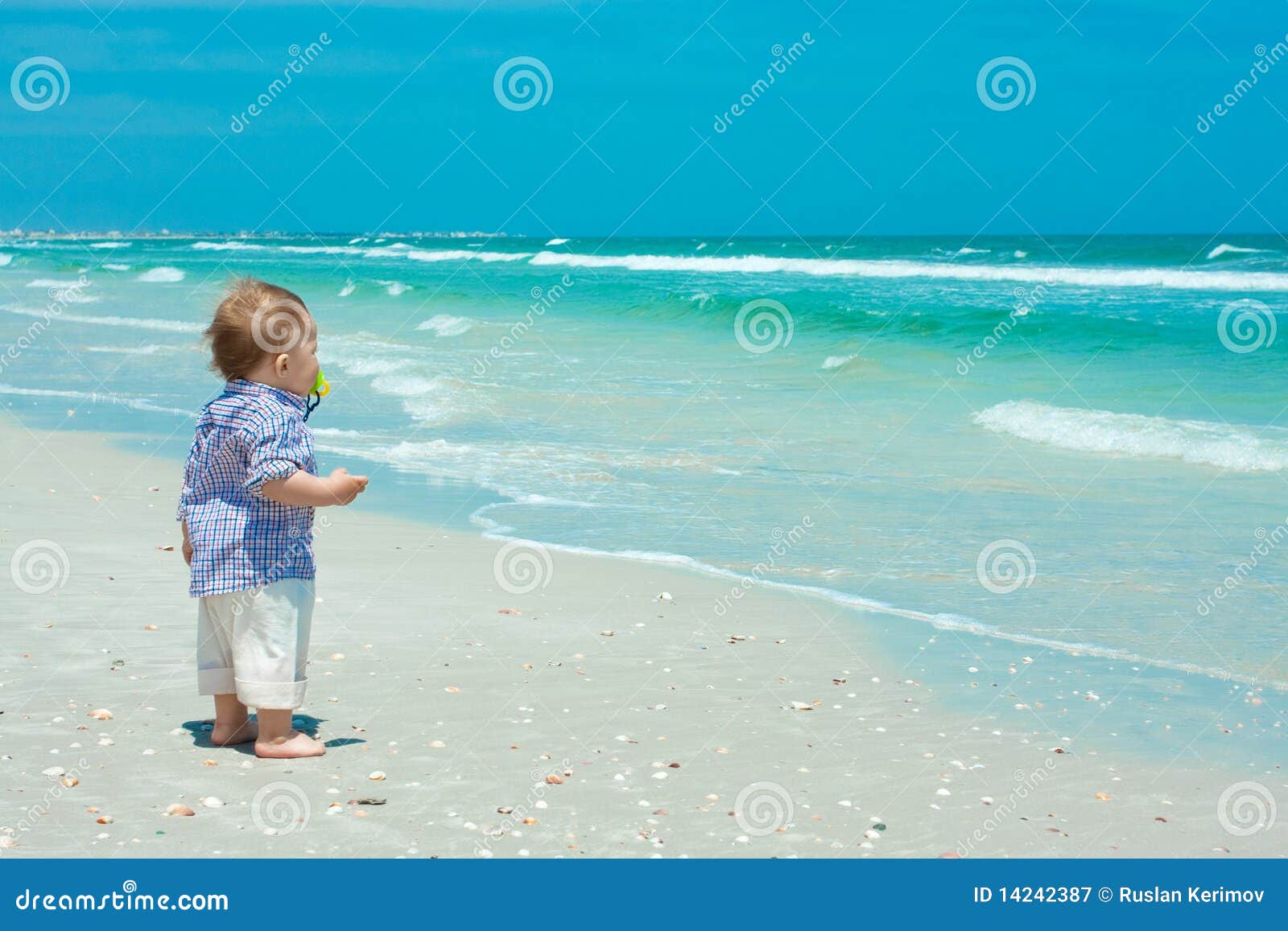 Child on a beach stock image. Image of cute, blue, little - 14242387
