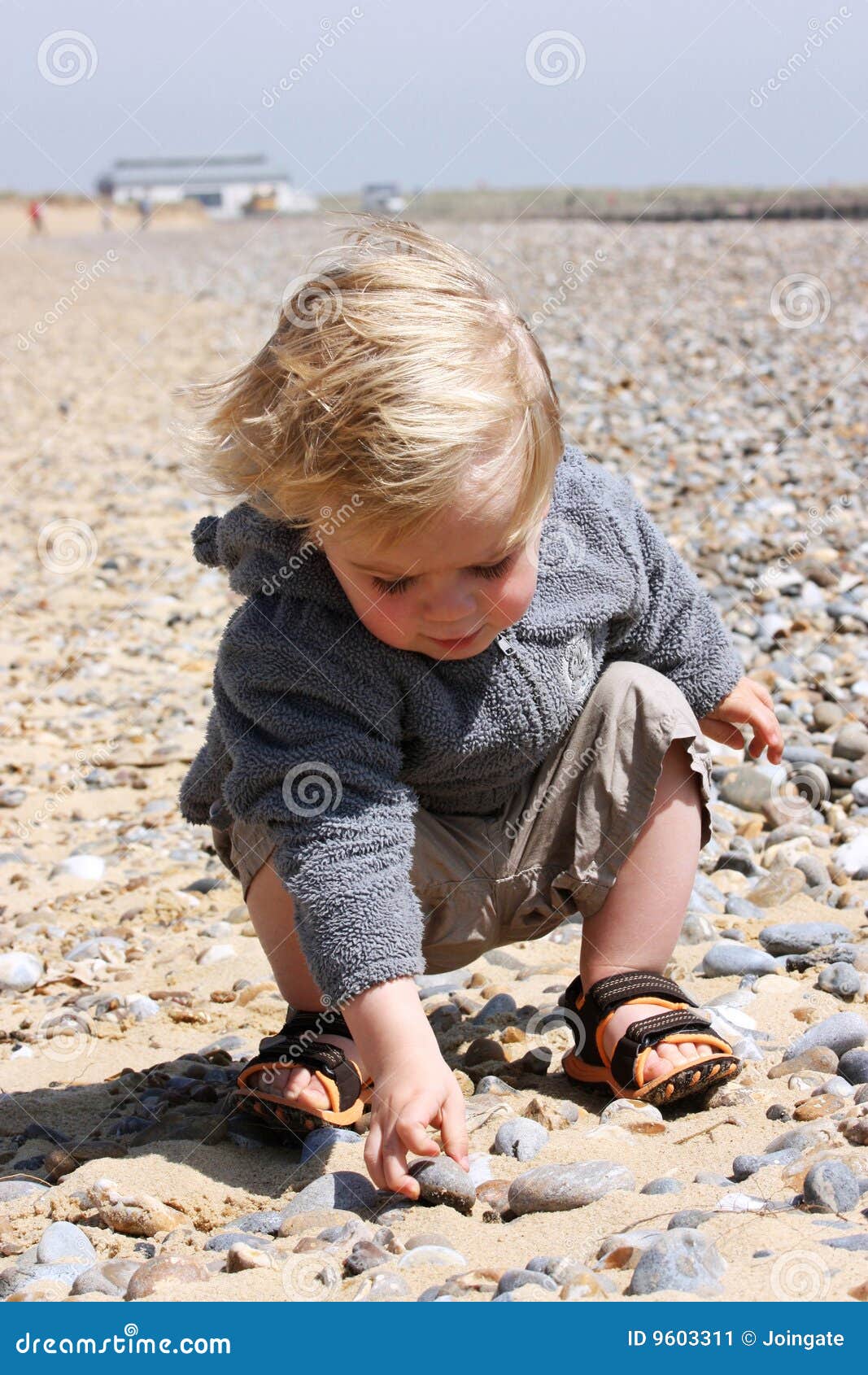 Child on Beach with Pebbles Stock Image - Image of shorts, southwold ...