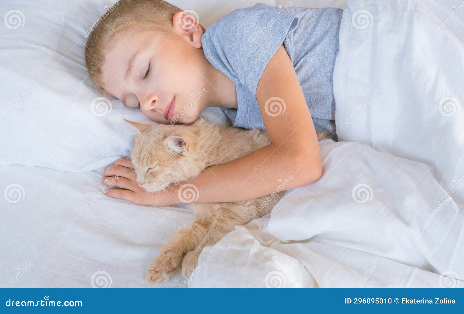 A Child in Bed Cannot Fall Asleep, Yawns, Grimaces and Plays with a ...