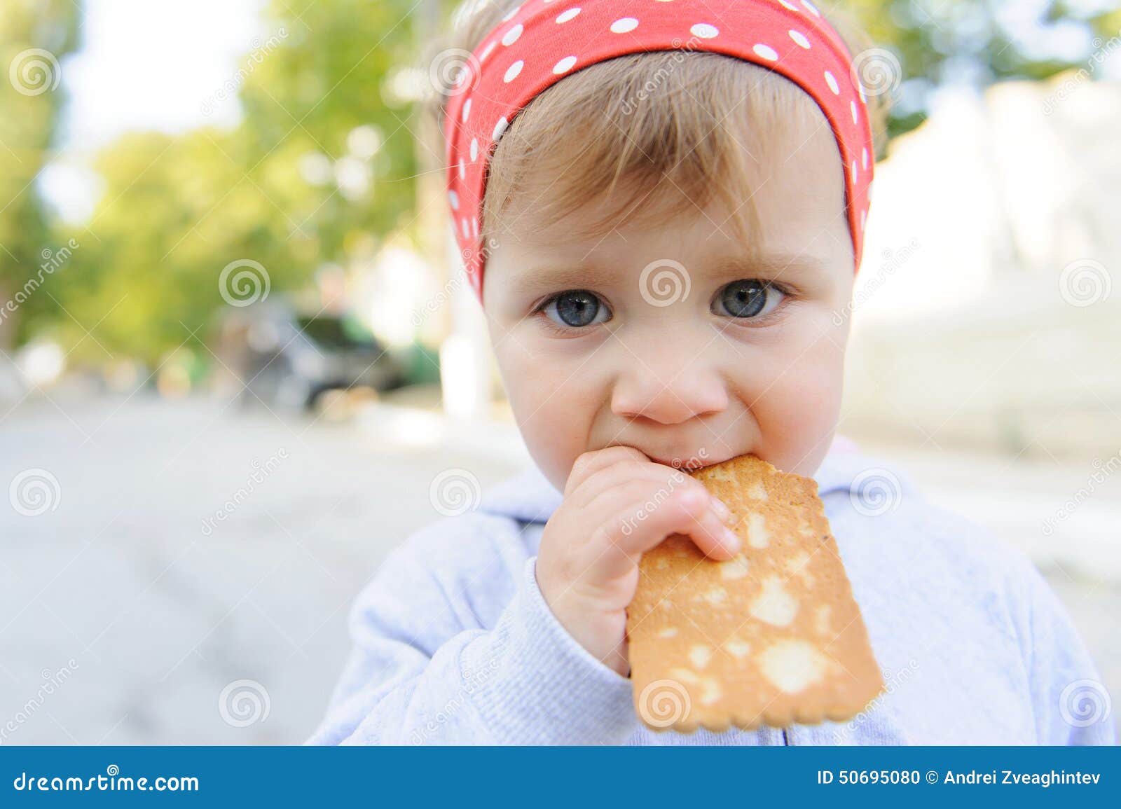 Child with Biscuit stock photo. Image of biscuit, culture - 50695080