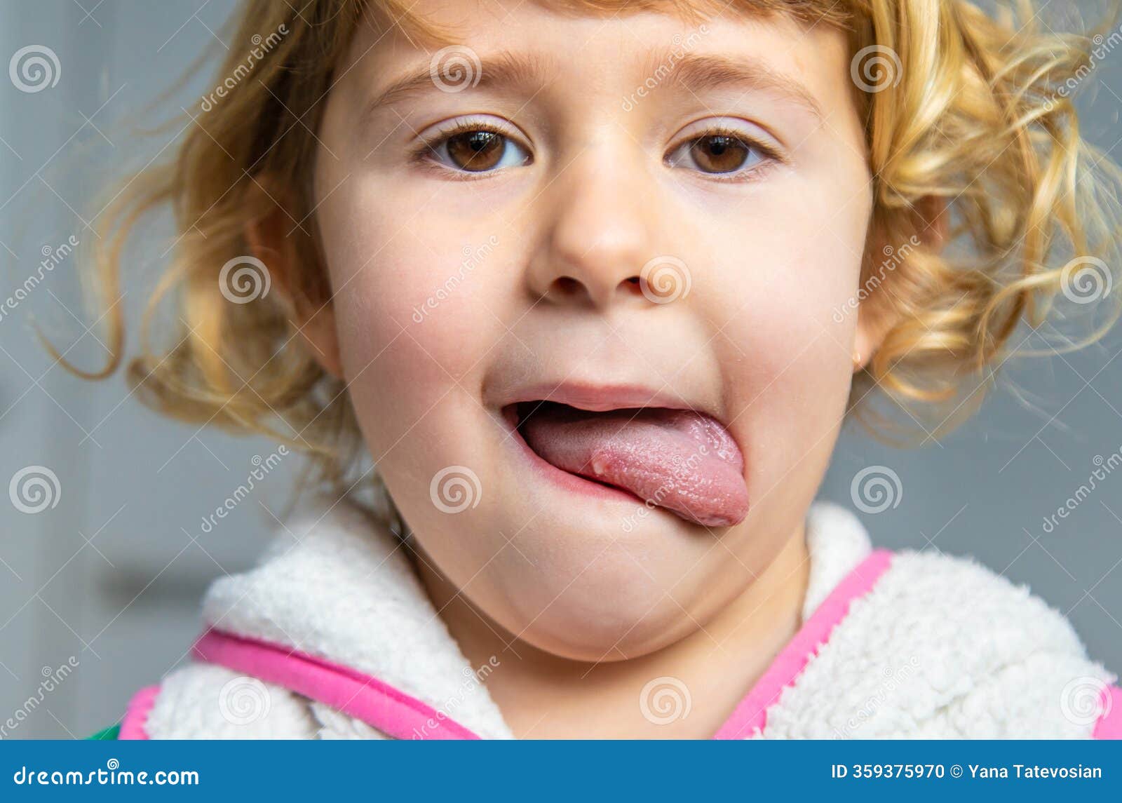 The Child Bit the Tongue of the Wound. Selective Focus Stock Photo ...