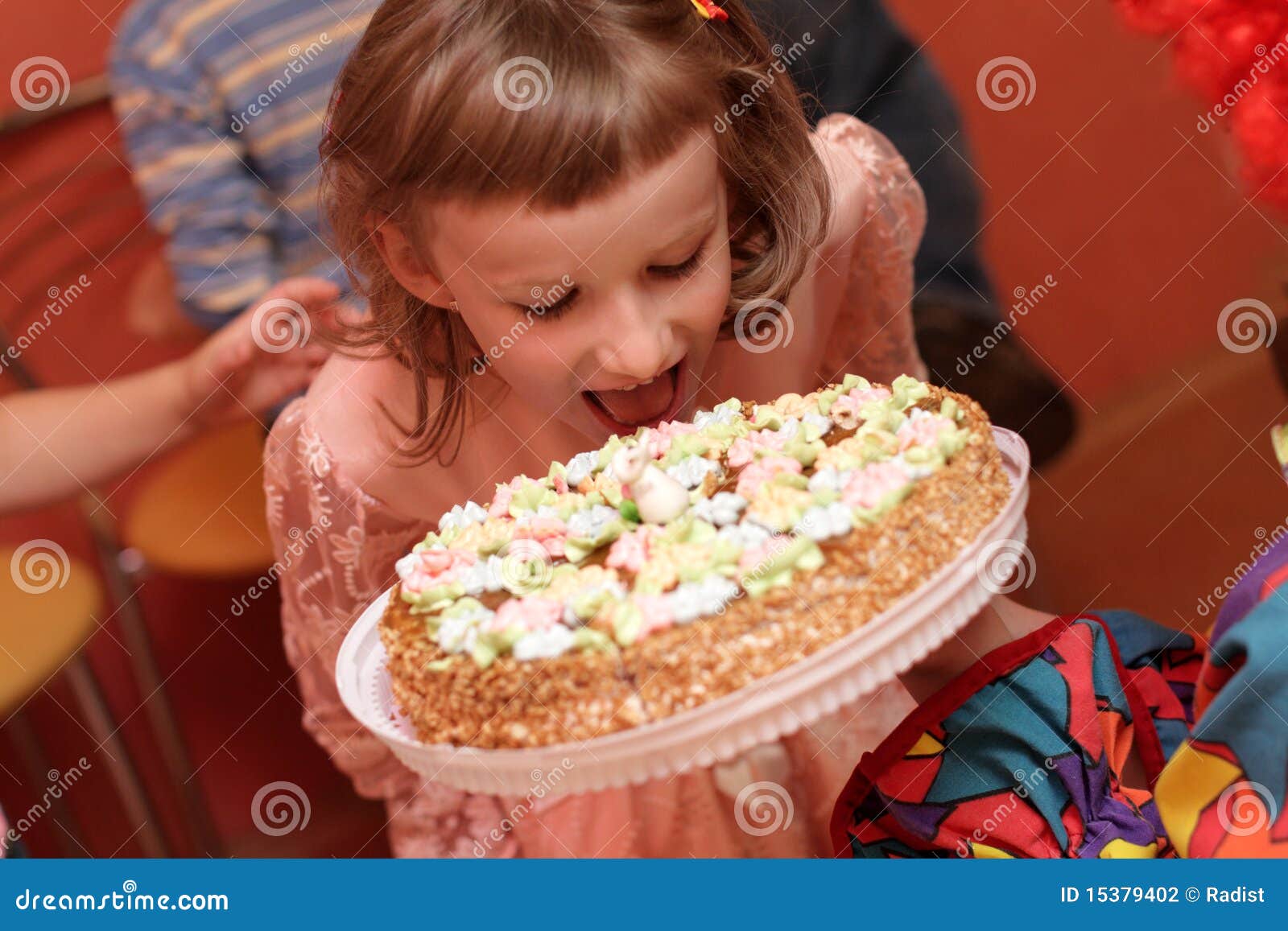 Child bites birthday cake stock photo. Image of eating - 15379402