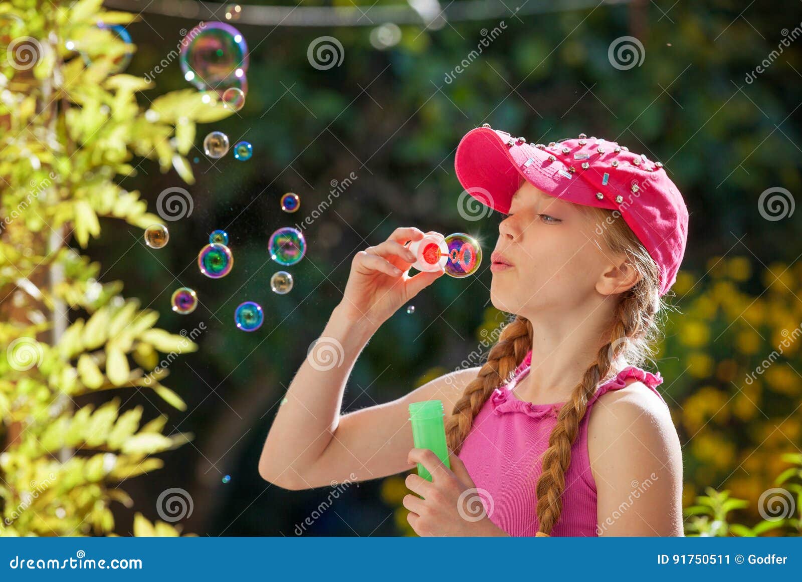 Child Blowing Bubbles Outdoors Stock Image - Image of bubble, playful ...