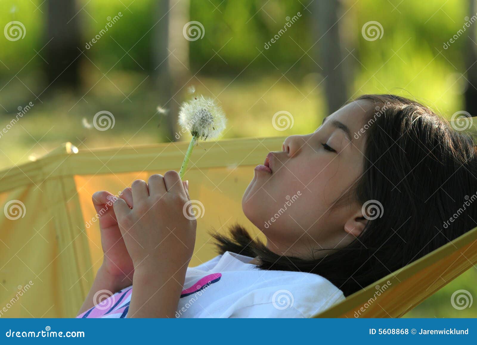 Child blowing dandelion stock photo. Image of happy, multiethnic - 5608868