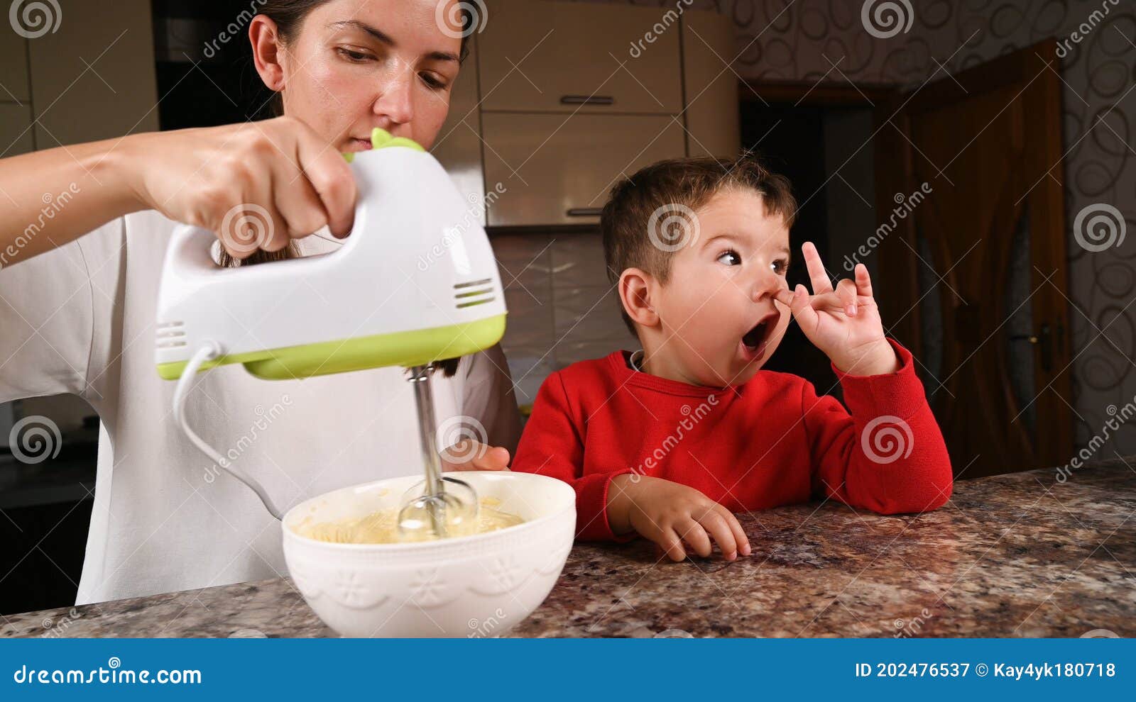 The Child is Bored in the Kitchen Stock Image - Image of bored, cheek ...