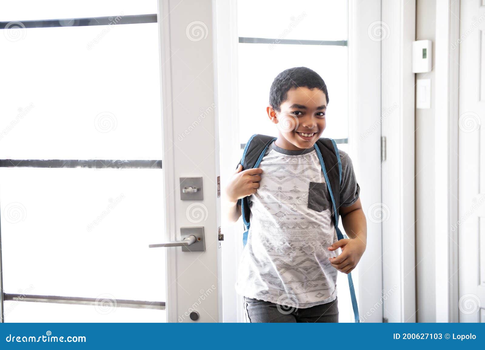 A Child Boy Coming Home Passing through the Door after School Stock ...