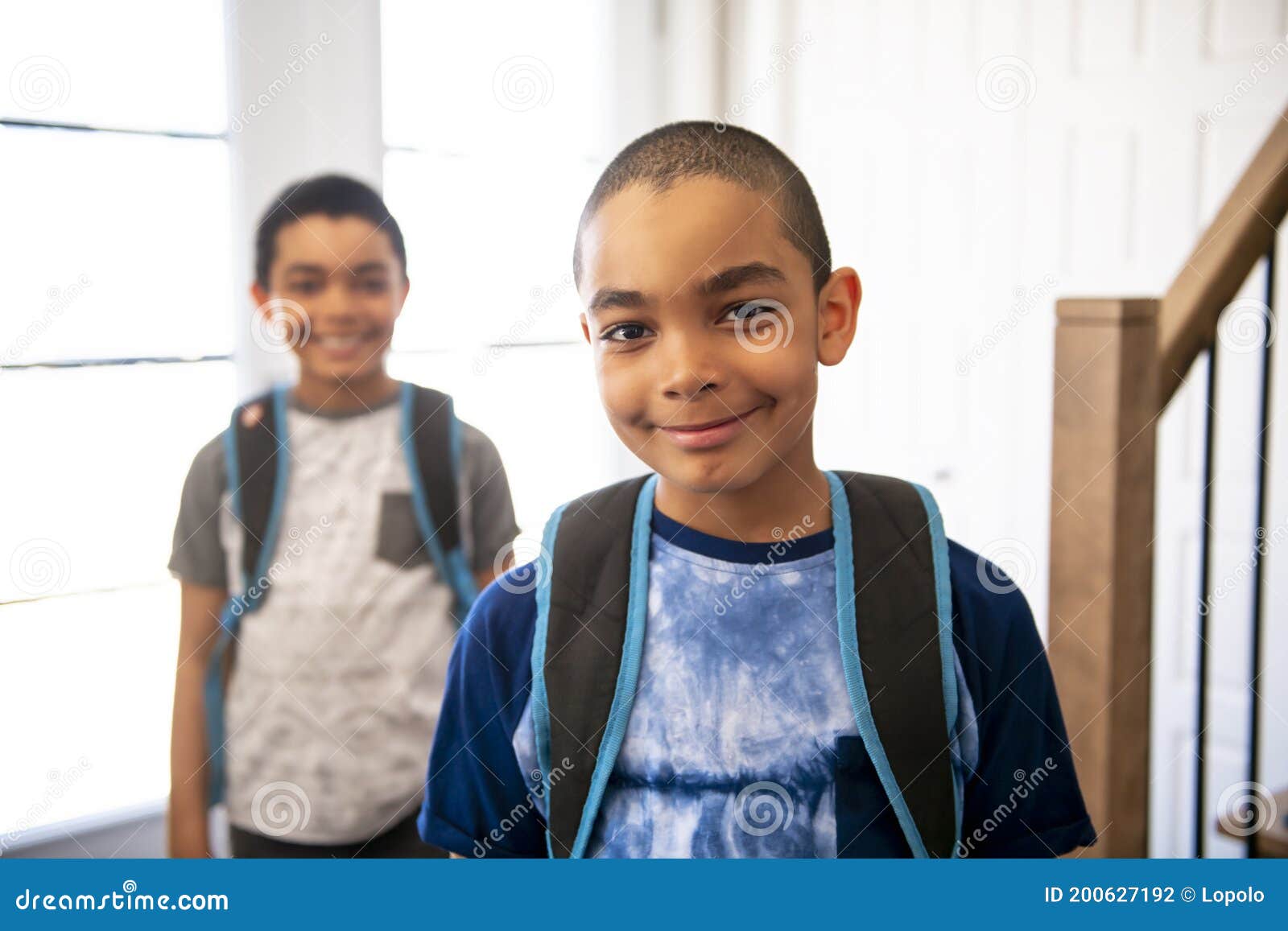 A Child Boy Coming Home Passing through the Door after School Stock ...