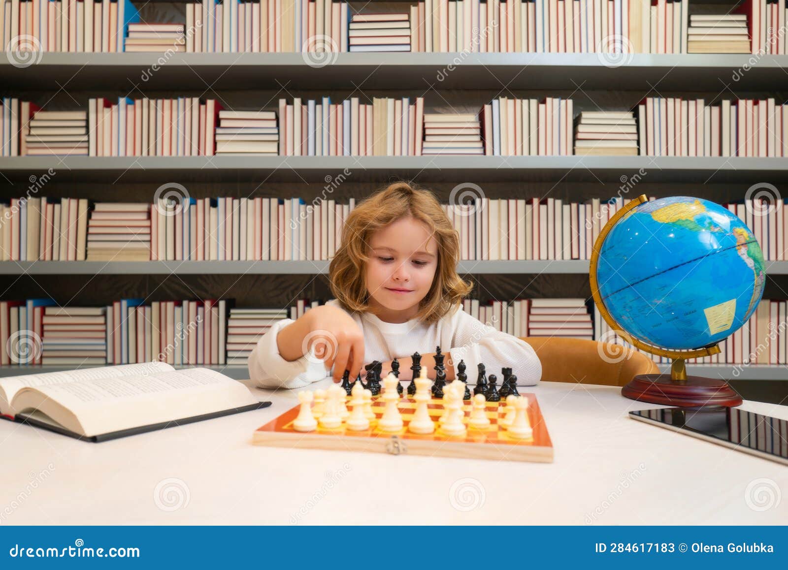Child Boy Developing Chess Strategy, Playing Board Game. Schoolboy ...