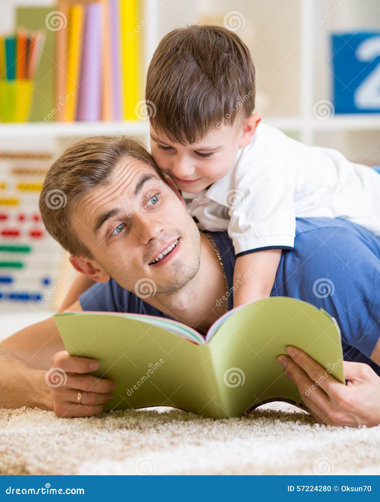 Child Boy and Father Read a Book on Floor at Home Stock Photo - Image ...