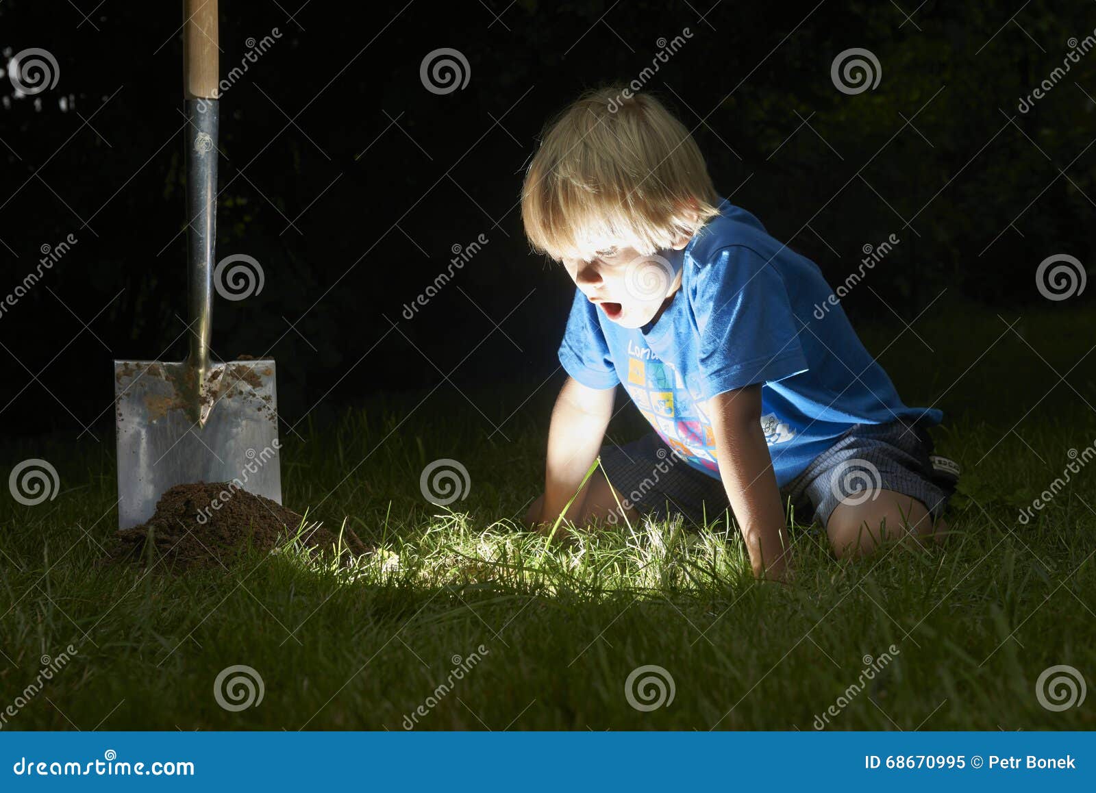 Child Boy Have Unearthed a Treasure in the Grass Stock Image - Image of ...