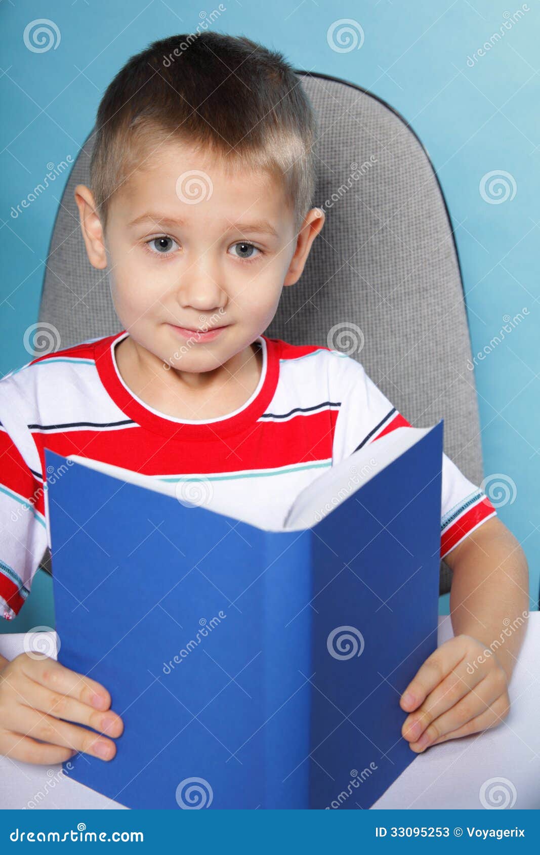 Child Boy Kid Reading a Book on Blue Stock Image - Image of school ...