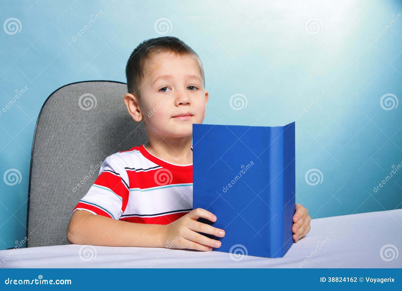 Child Boy Kid Reading a Book on Blue Stock Photo - Image of read ...